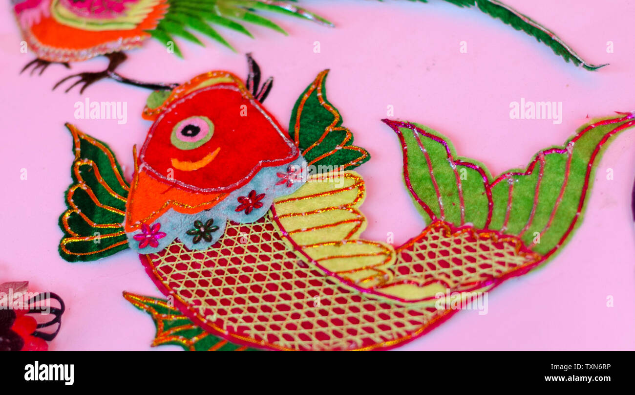 Embroidered fish hi-res stock photography and images - Alamy