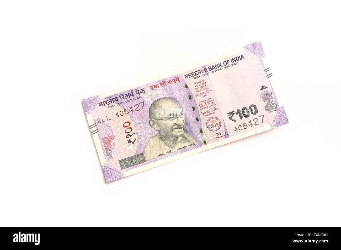 Indian 100 rupees isolated on white background Stock Photo - Alamy