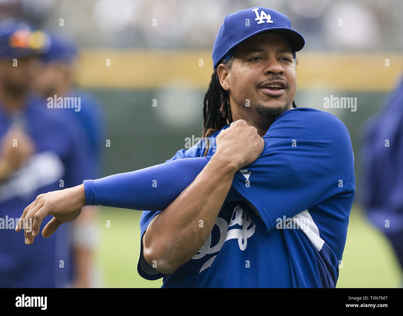 Los Angeles Dodgers left fielder Manny Ramirez stretches before batting ...
