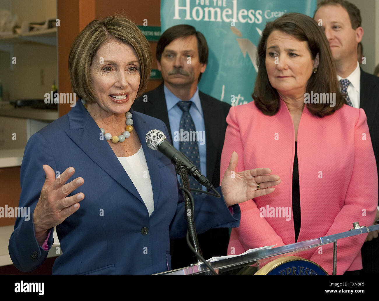 Speaker of the House Nancy Pelosi (D-CA) (L) delivers remarks during ...