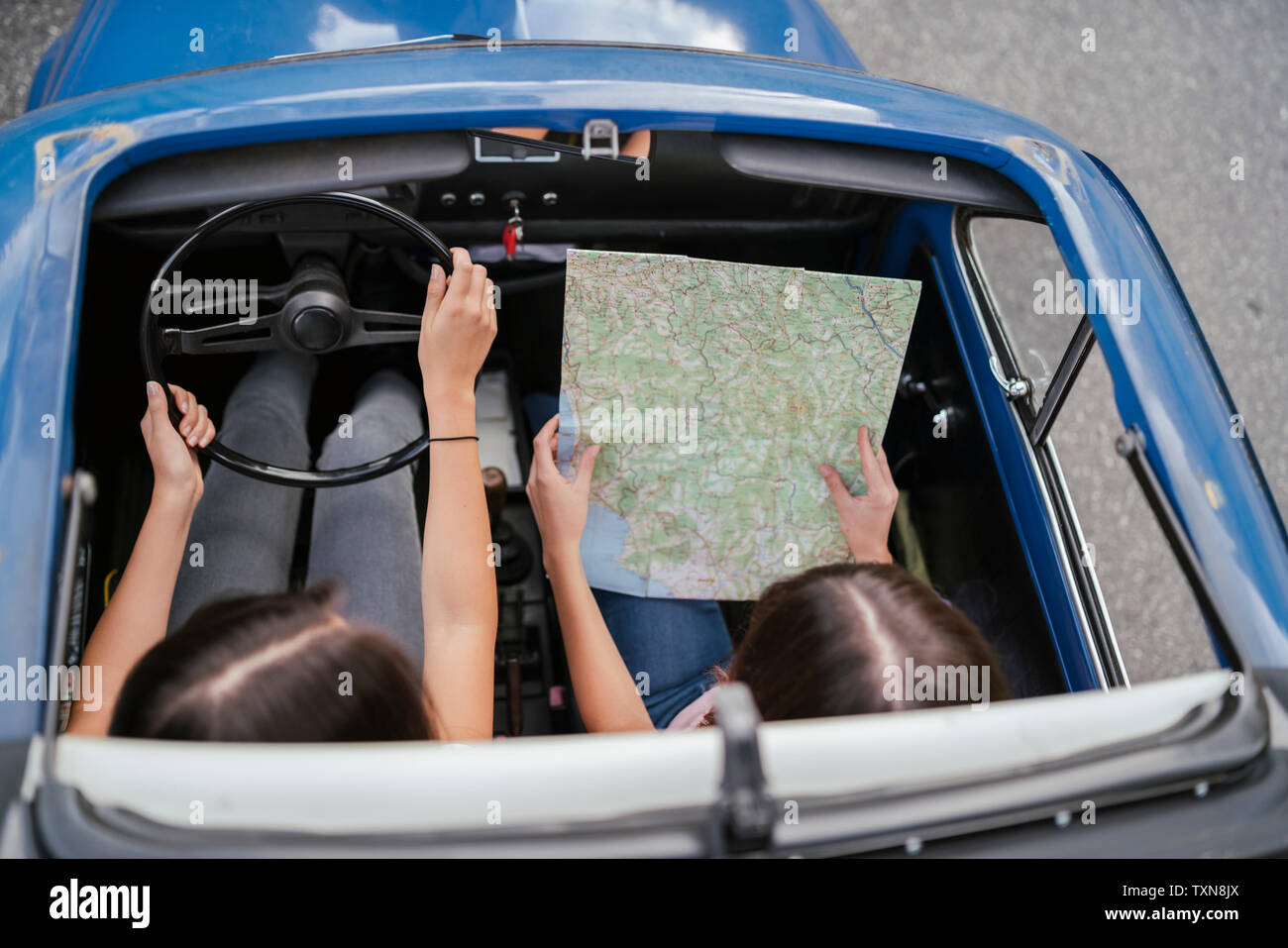 Reading map inside car hi-res stock photography and images - Alamy