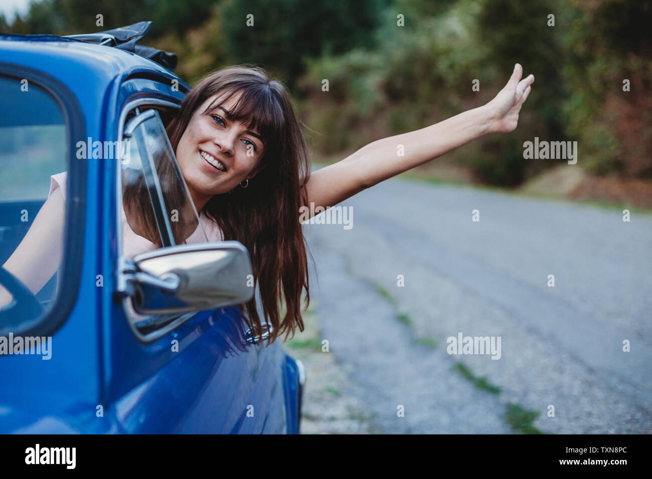 Woman with her arm out hi-res stock photography and images - Alamy