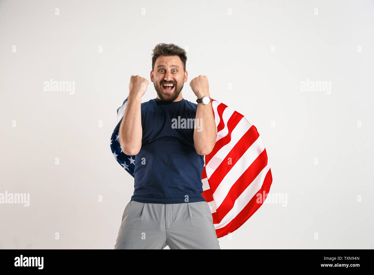 Celebrating an Independence day. Stars and Stripes. Young man with the ...