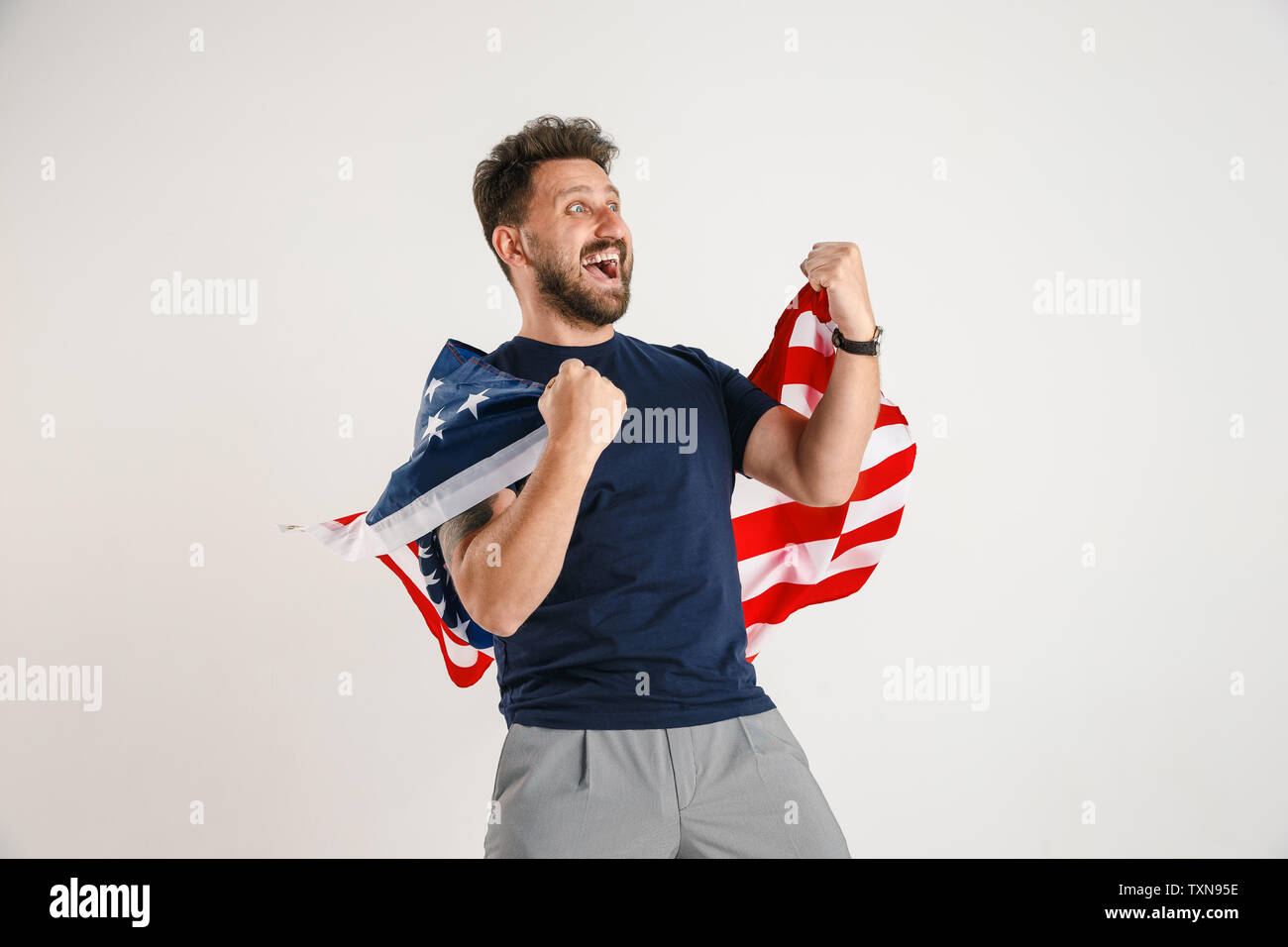 Celebrating an Independence day. Stars and Stripes. Young man with the ...