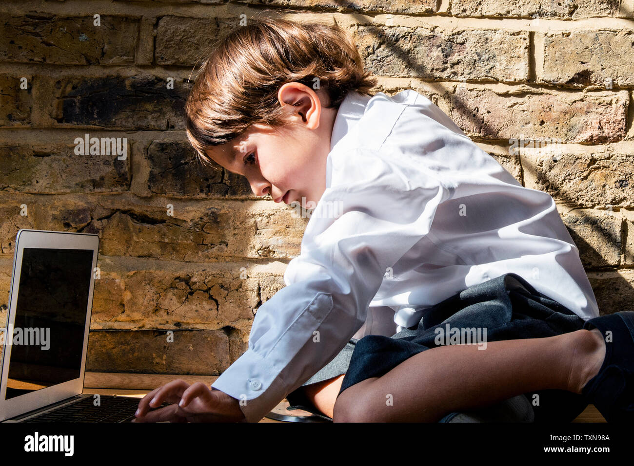 Boy school uniform hi-res stock photography and images - Alamy