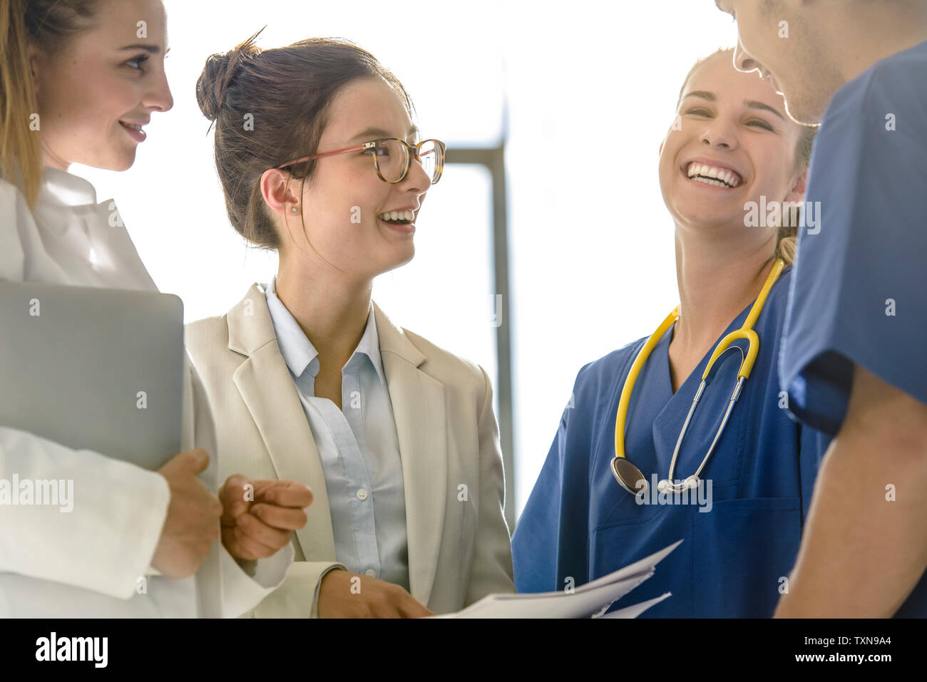 Female doctor laughing hi-res stock photography and images - Alamy