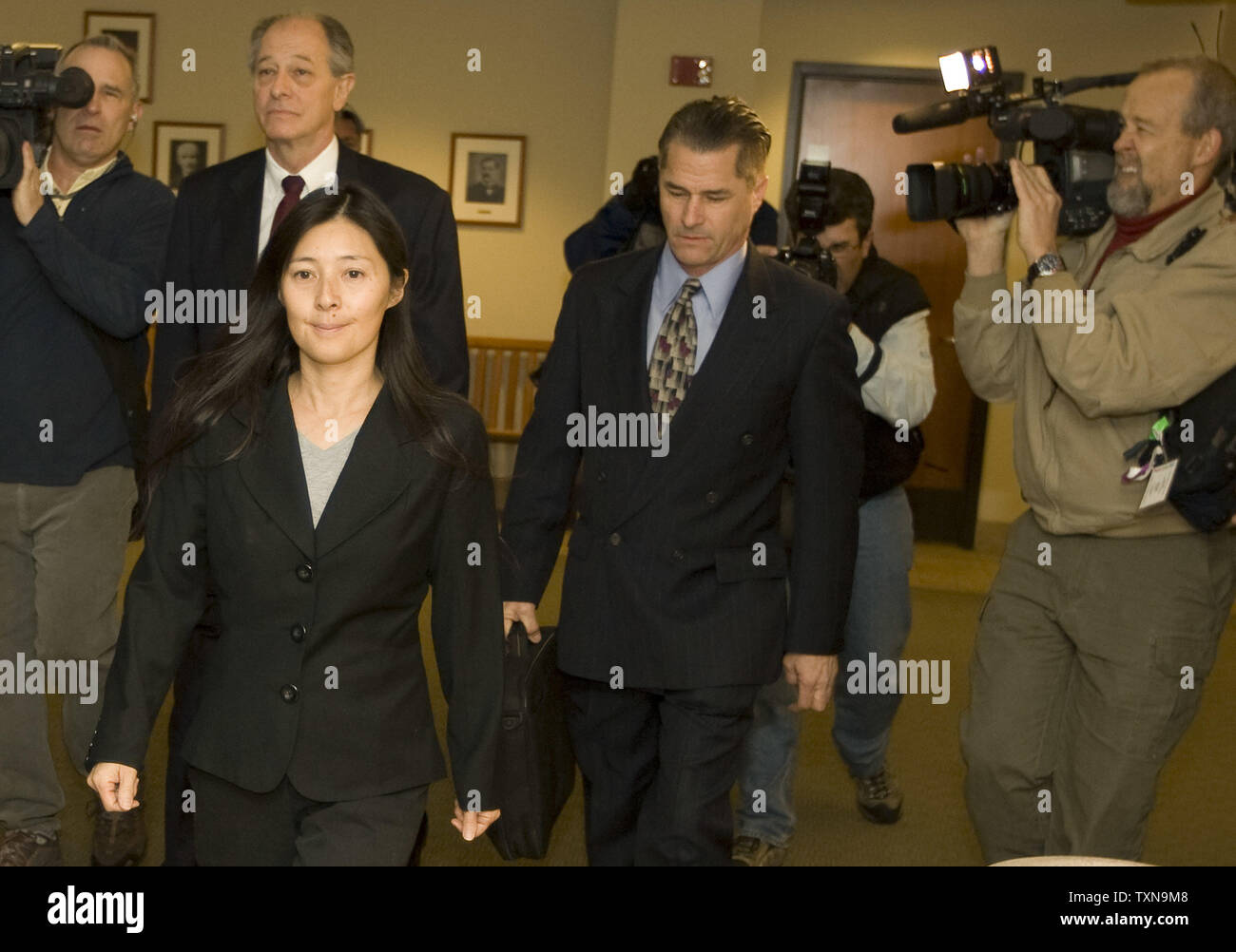 "Balloon Boy" hoax parents Richard (R) and Mayumi Heene arrive with ...