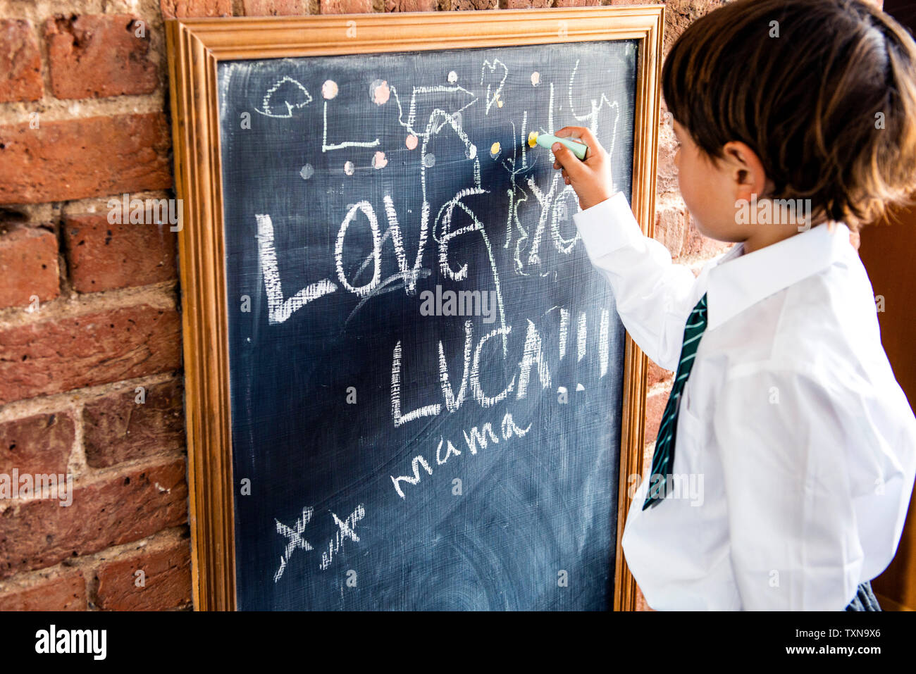 School boy love uniform hi-res stock photography and images - Alamy
