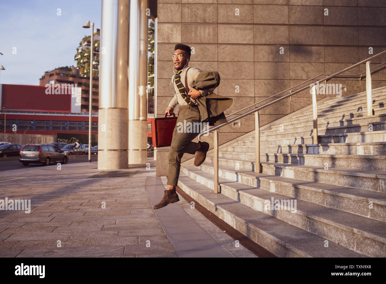 Jumping down stairs hi-res stock photography and images - Alamy