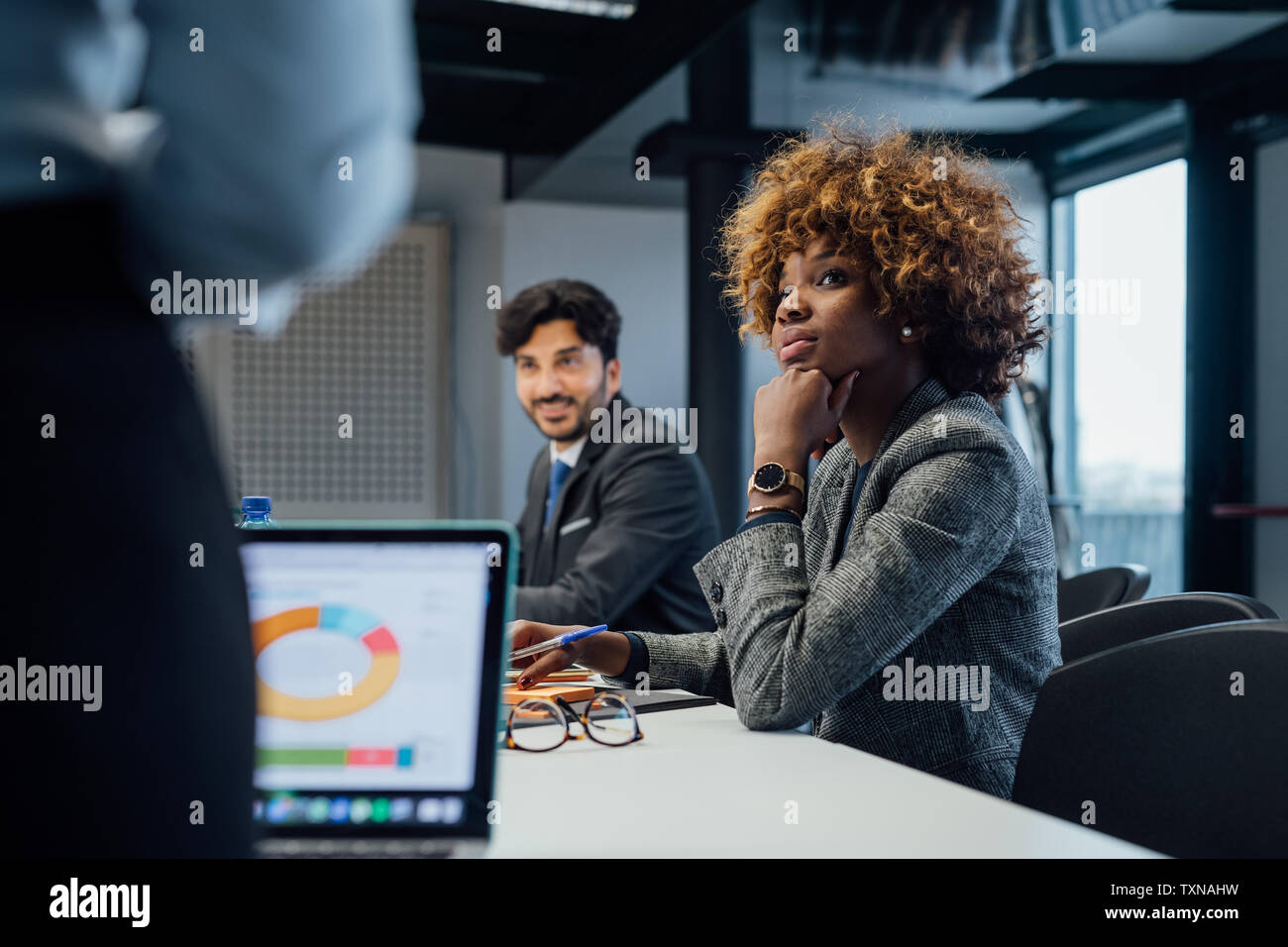 Business partners at brainstorming meeting in office Stock Photo - Alamy