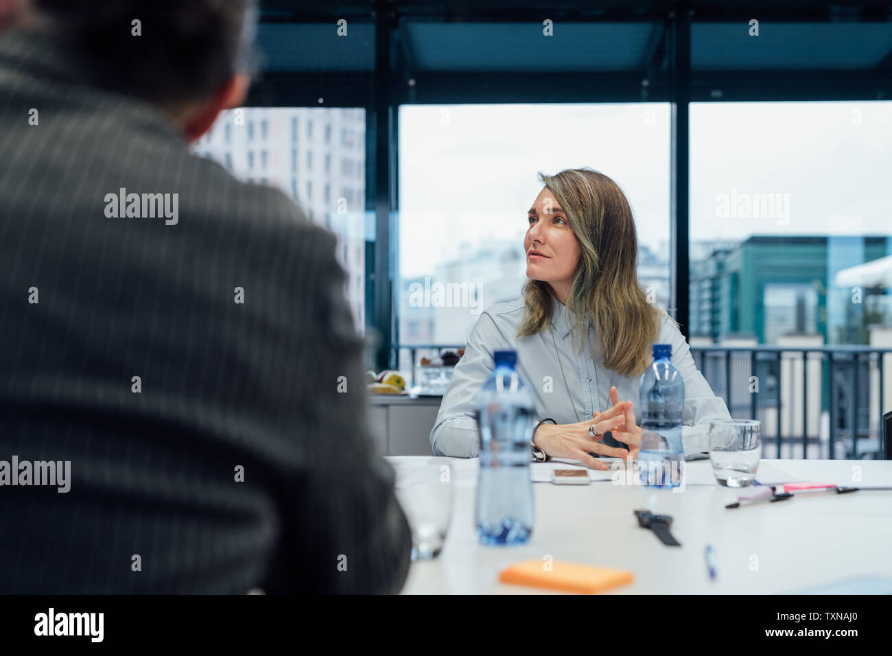 Business partners at brainstorming meeting in office Stock Photo - Alamy