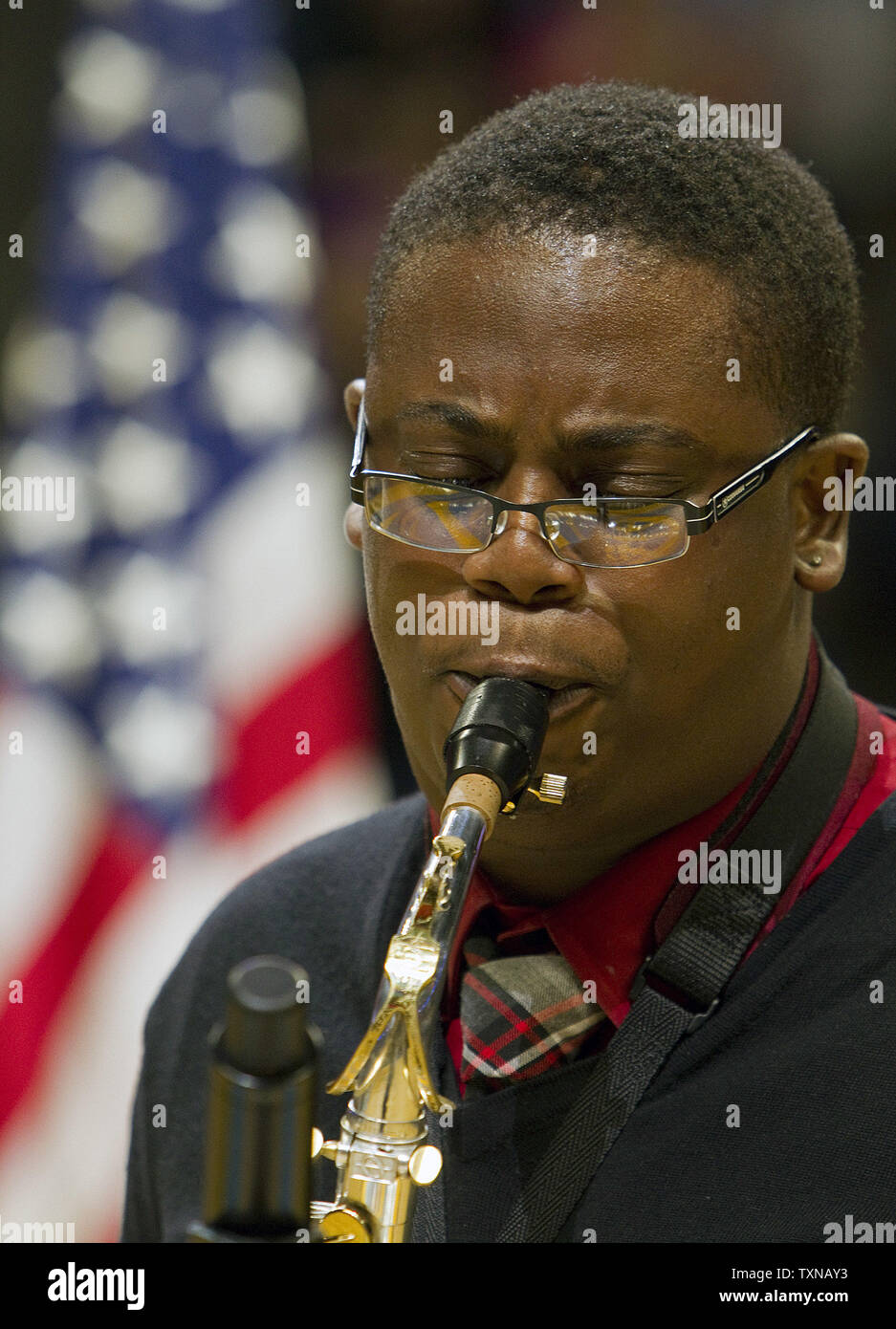 Saxophone player Harold Rapp performs the National Anthem before the ...