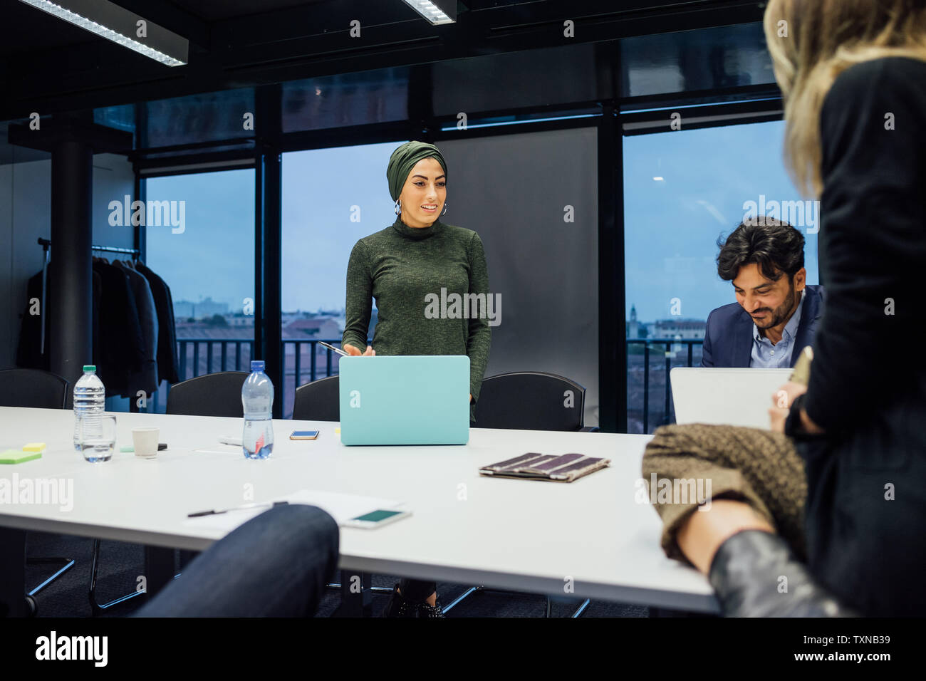 Business partners at brainstorming meeting in office Stock Photo - Alamy