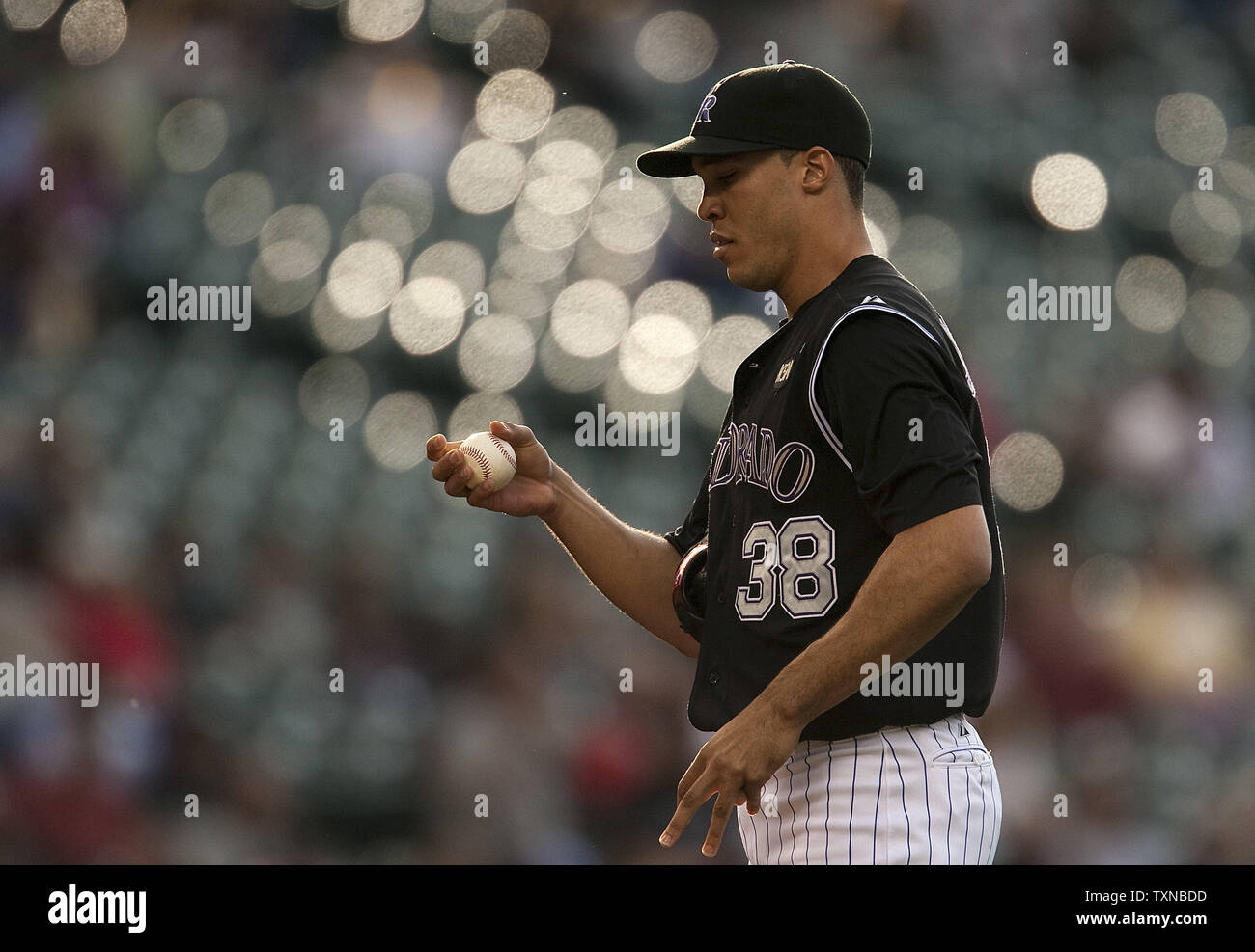 Colorado Rockies pitcher Ubaldo Jimenez prepares to pitch for his ninth ...