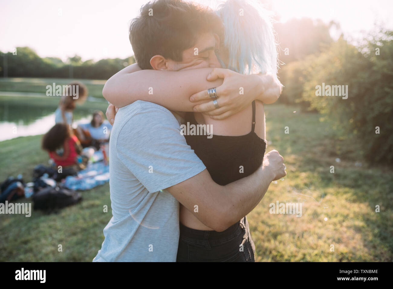 Hugging over shoulder hi-res stock photography and images - Alamy