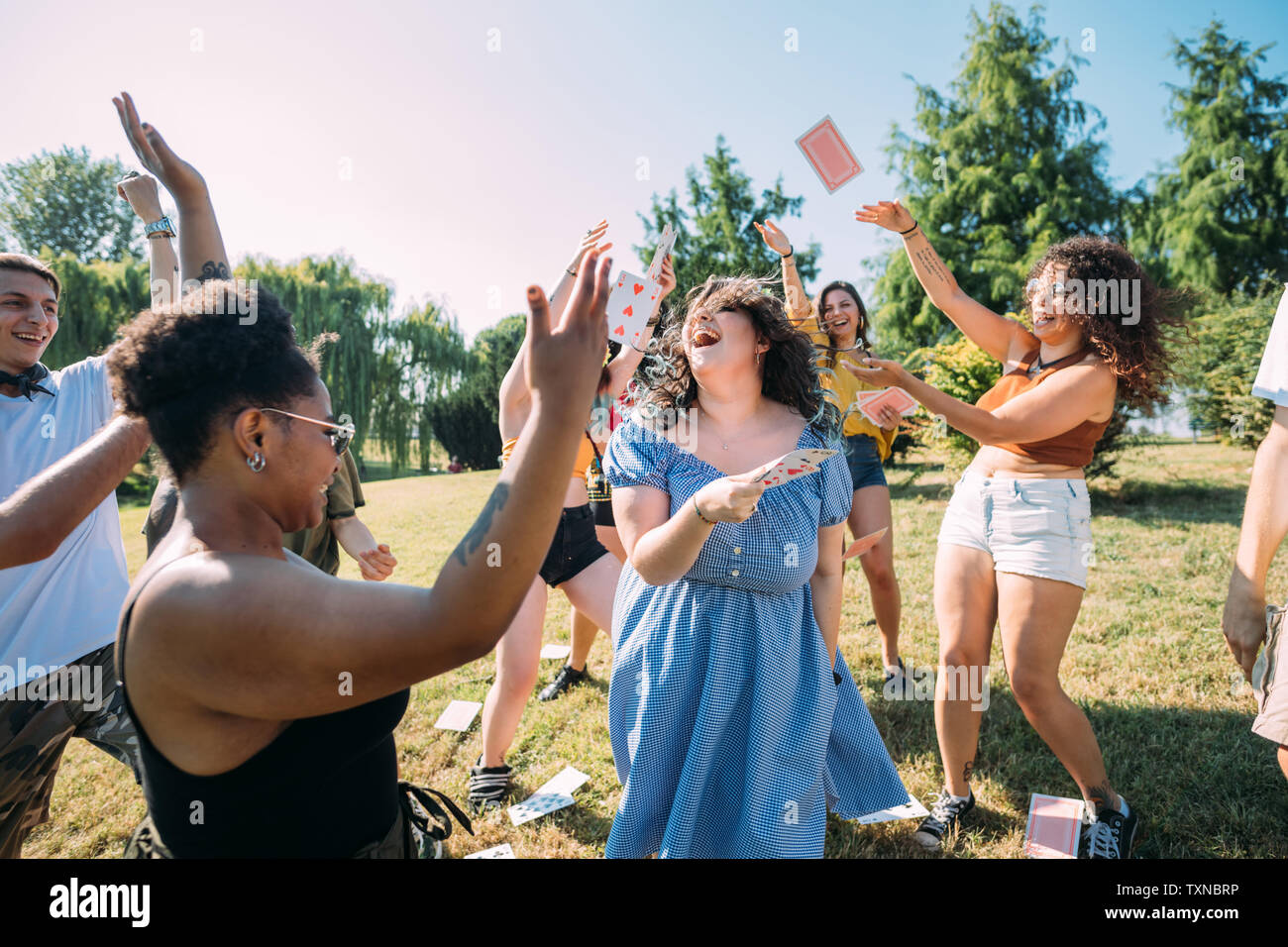 Throwing cards in the air hi-res stock photography and images - Alamy
