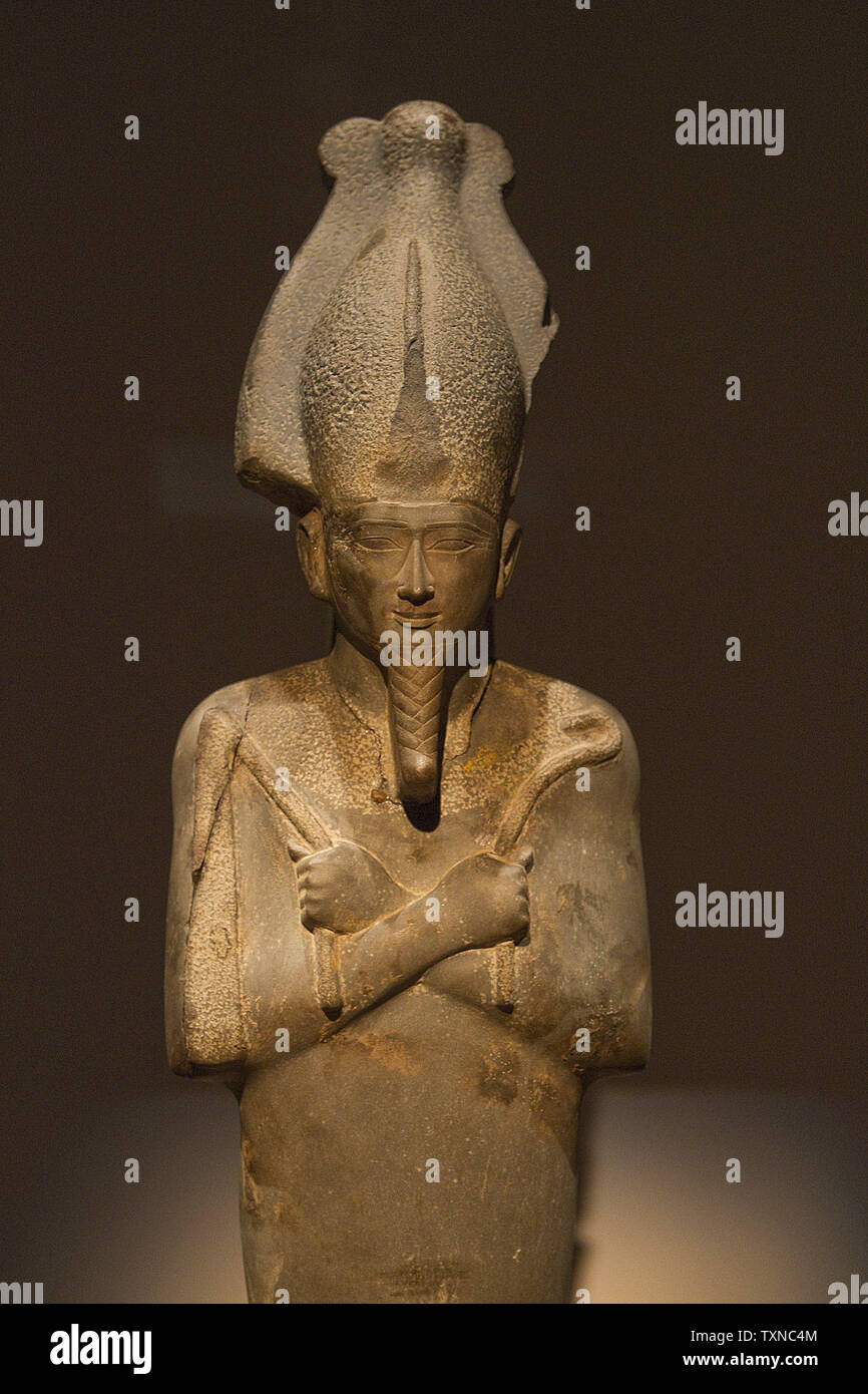 The standing statue of Osiris is displayed at the King Tut traveling ...