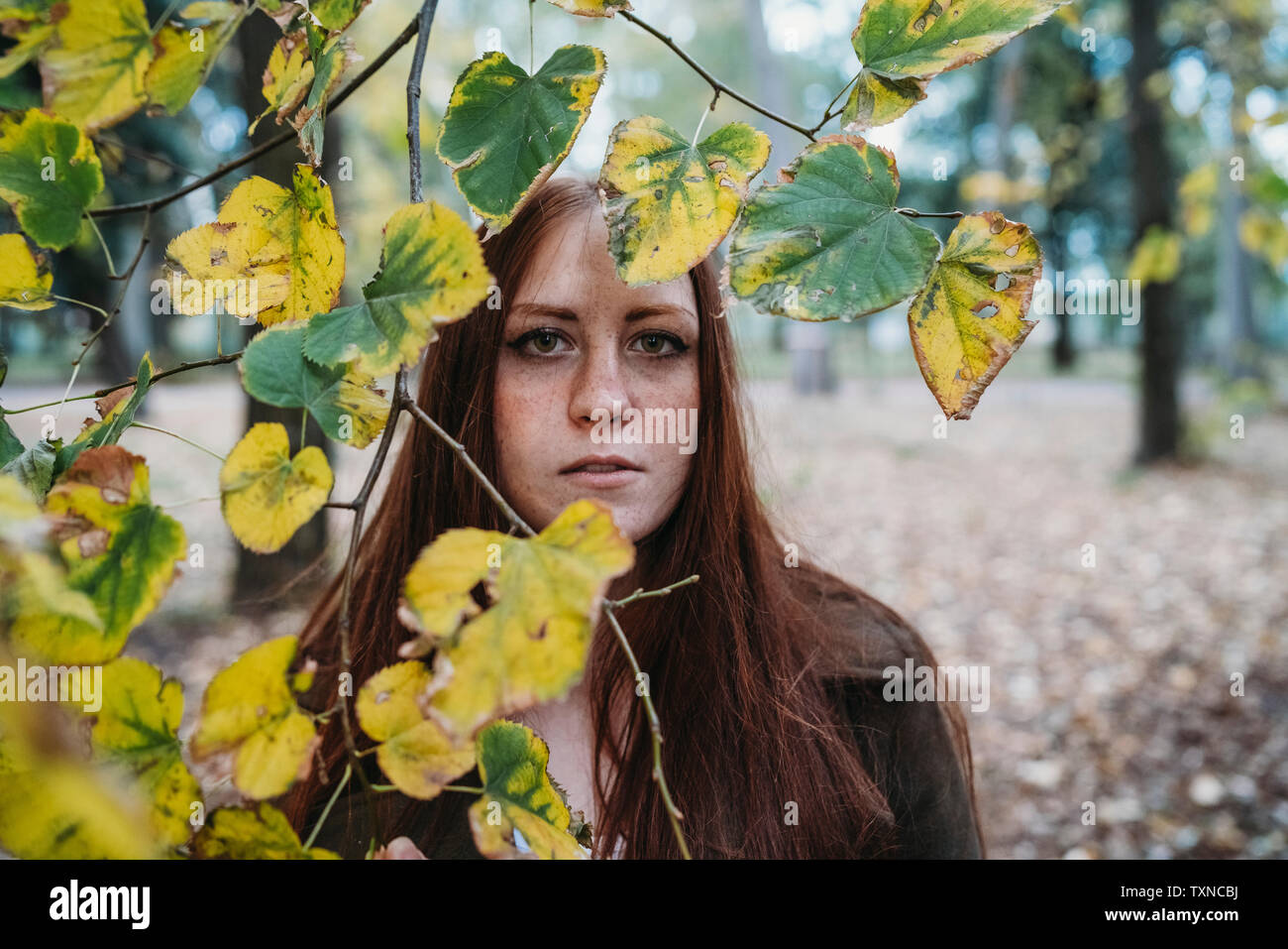 Hiding behind hair hi-res stock photography and images - Alamy