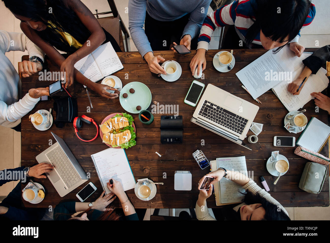 Overhead view of business meeting hi-res stock photography and images ...