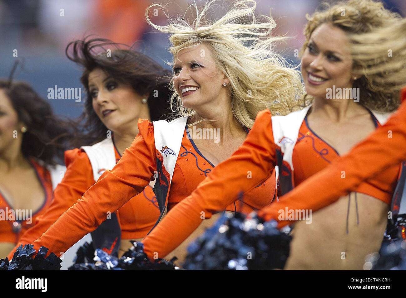 The Denver Broncos cheerleaders perform between quarters of the ...