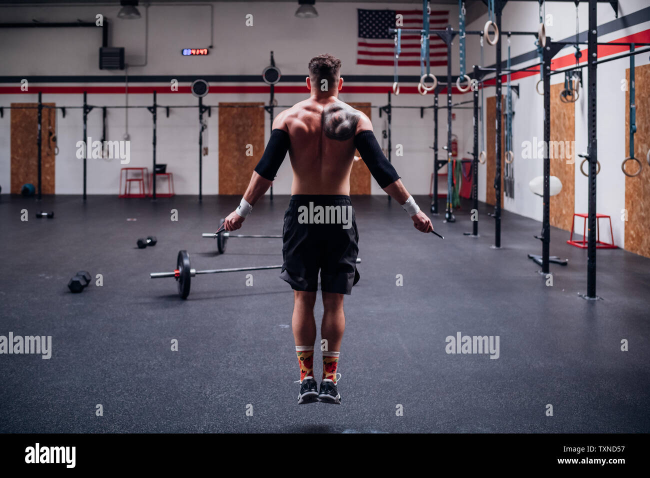 Rear view muscular young hi-res stock photography and images - Alamy