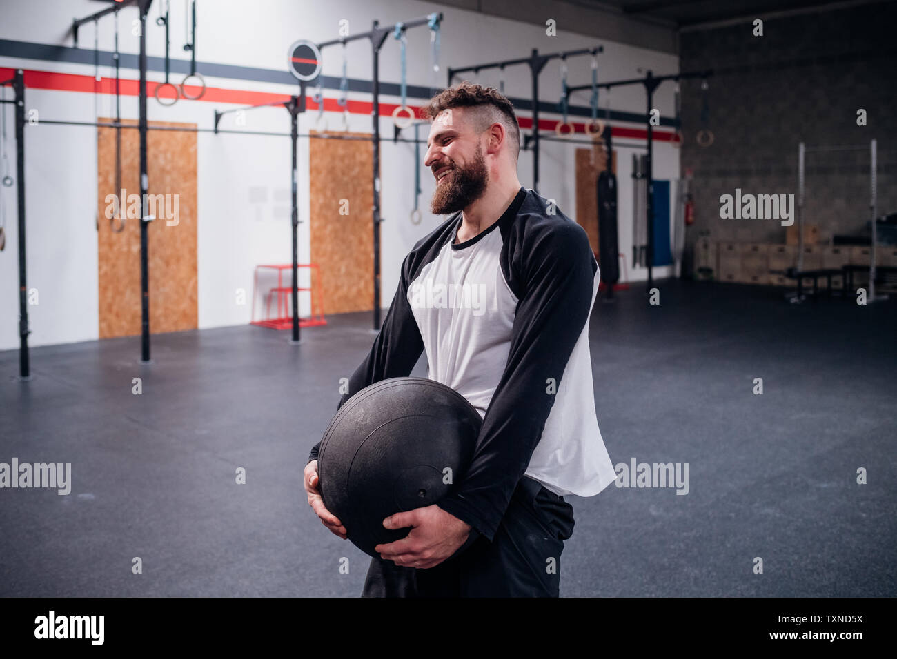 Man lifting stone hi-res stock photography and images - Alamy