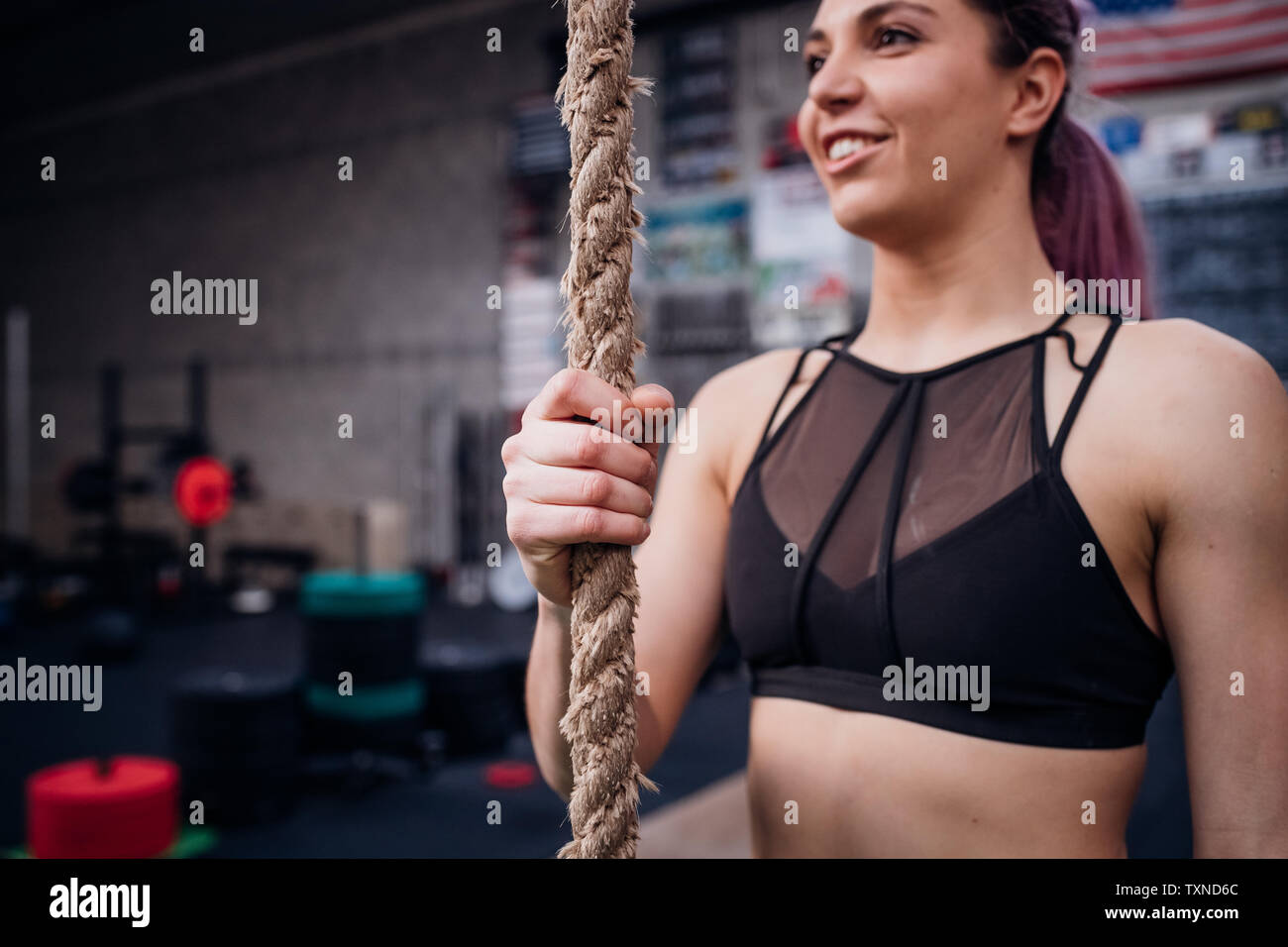 Female holding rope hi-res stock photography and images - Alamy