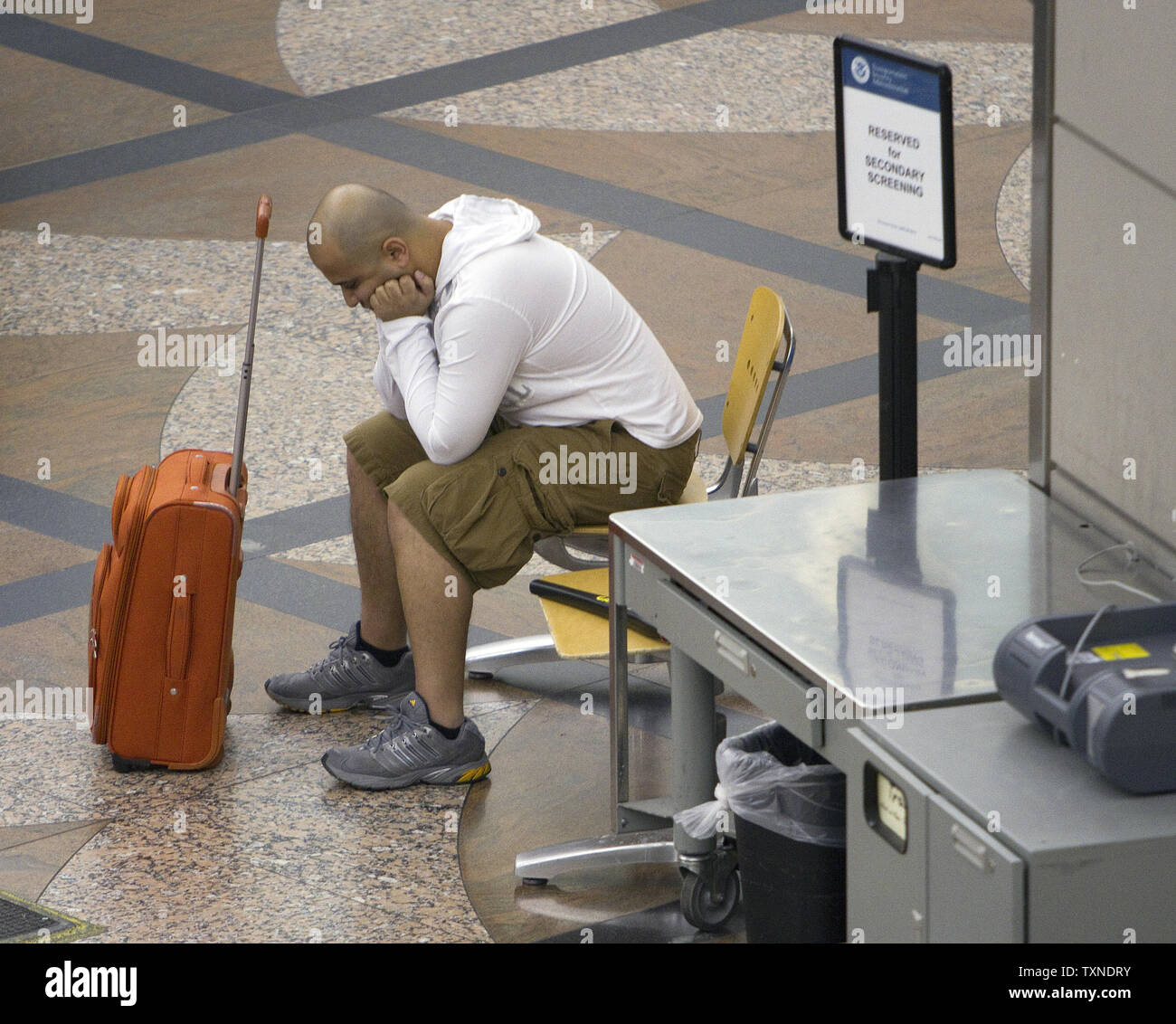 Airport pat down hi-res stock photography and images - Alamy