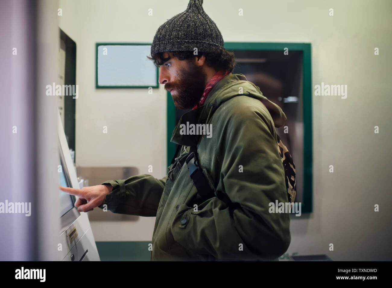 Young man cash machine hi-res stock photography and images - Alamy