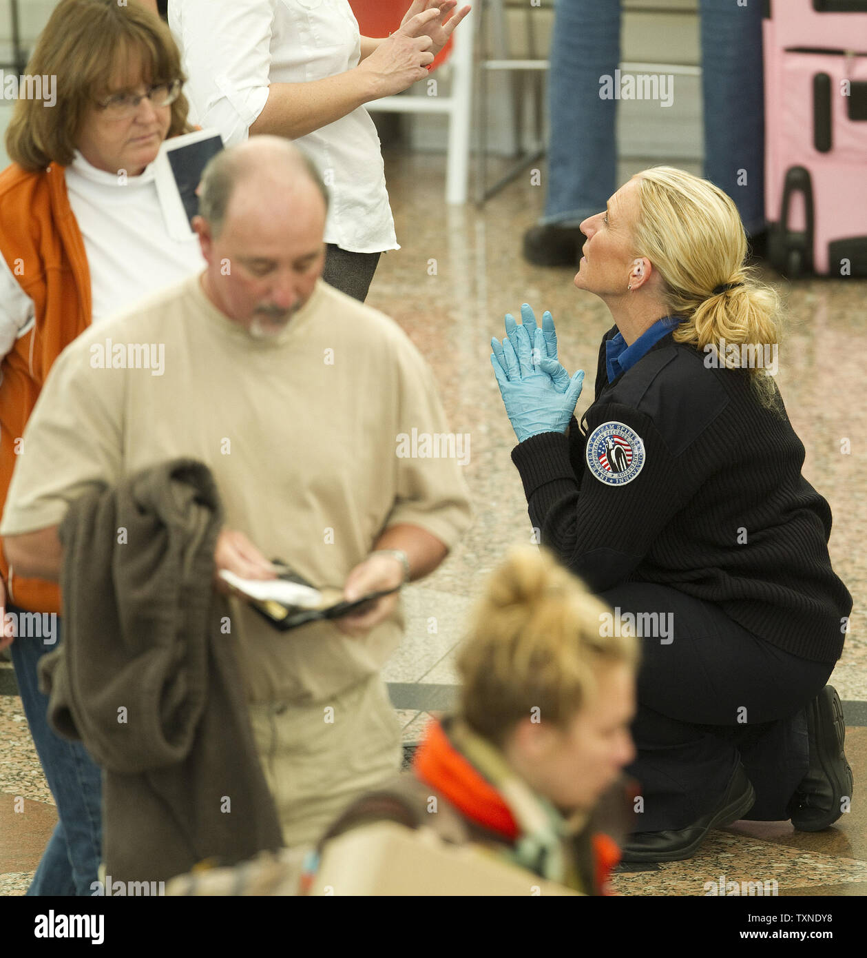 Airport pat down hi-res stock photography and images - Alamy