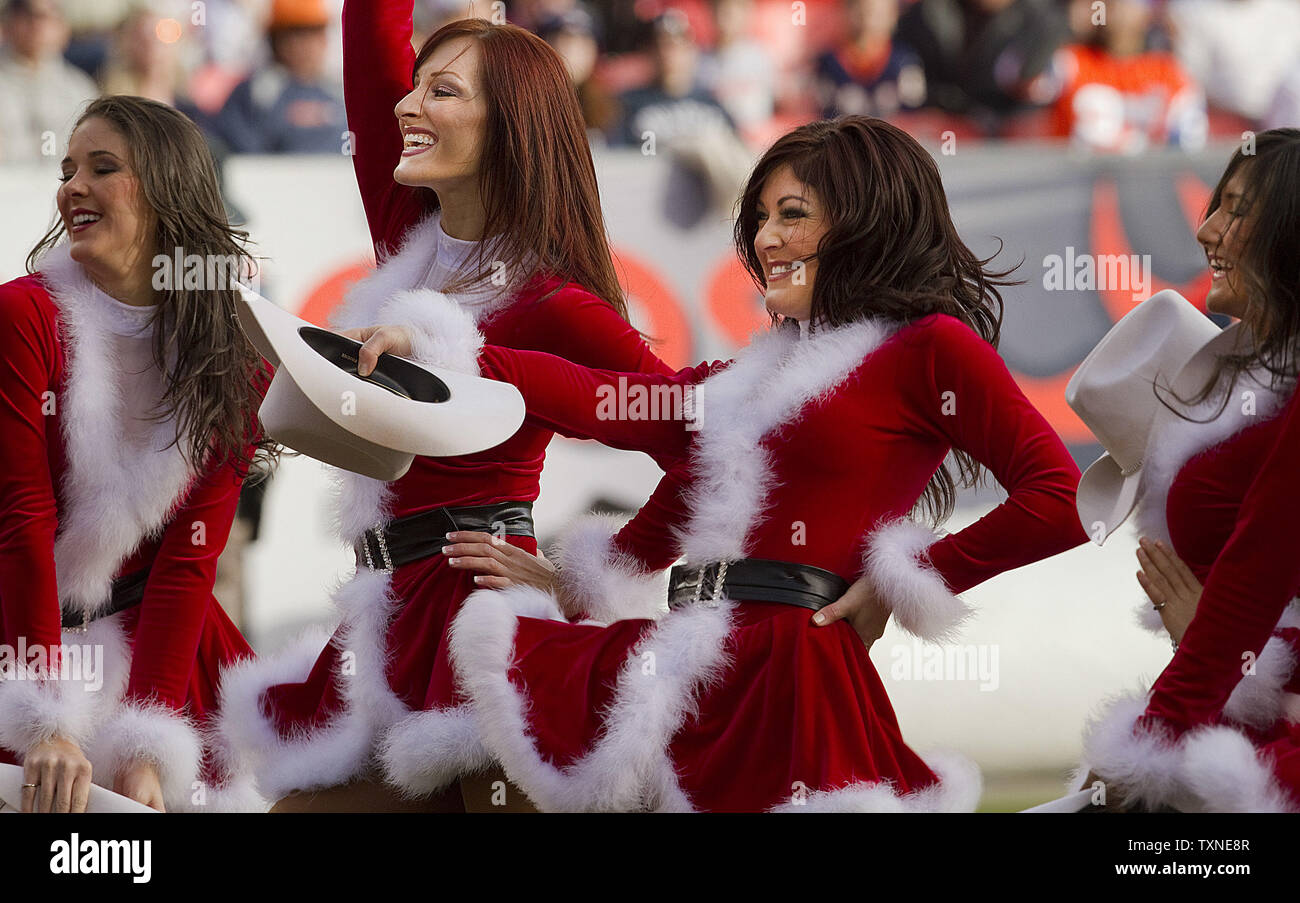 The Denver Broncos cheerleaders perform in their Santa Suits at Invesco ...