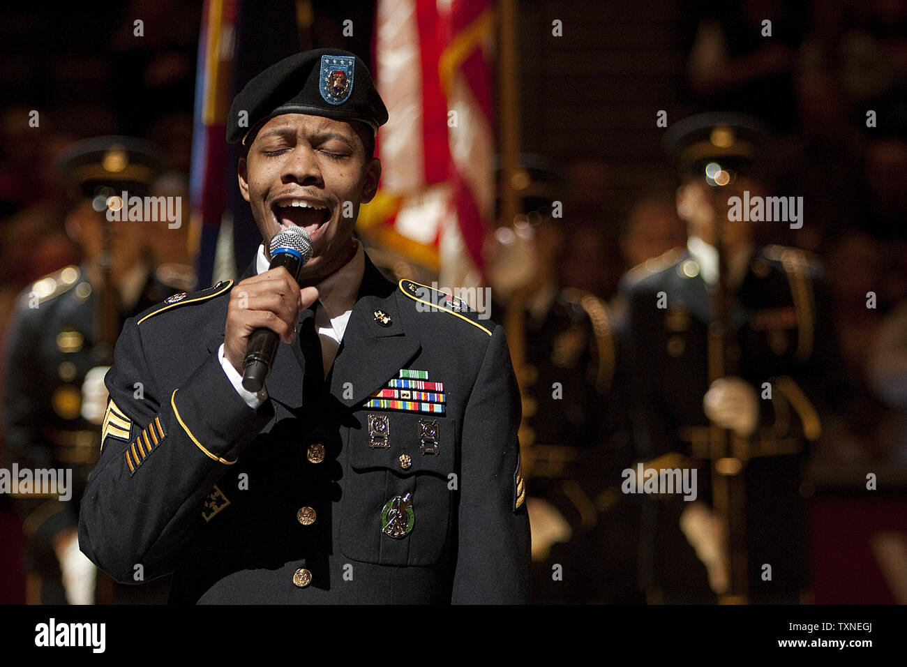 National Guard Sergeant Winford Beasley sings the national anthem at ...