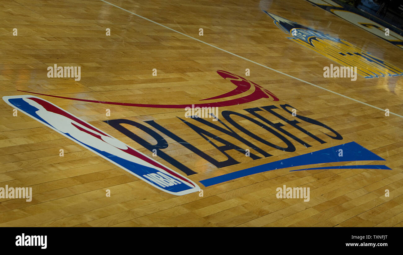The NBA logo stands out on the Pepsi Center basketball floor in the ...