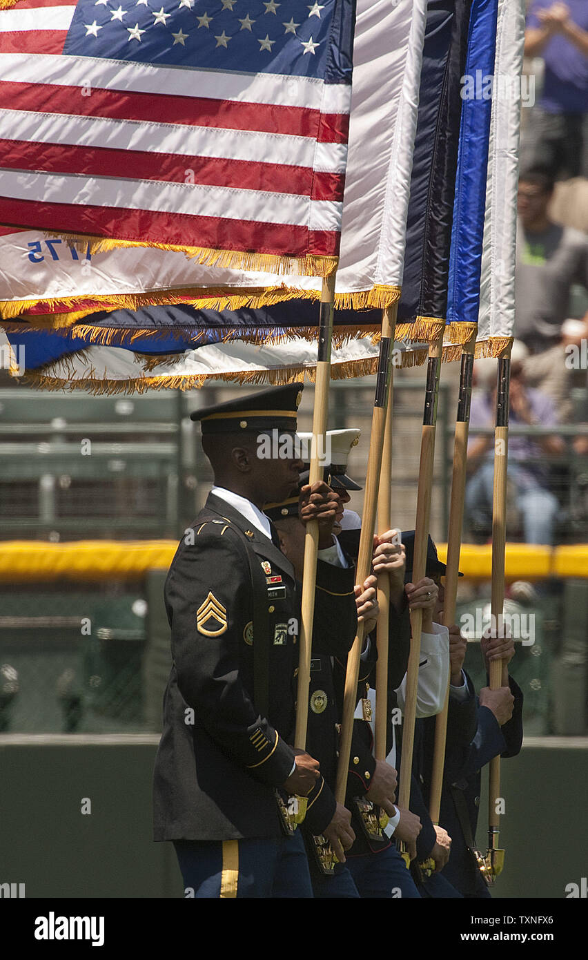 The NORAD and NORTHCOM joint color guard march to the center of the ...