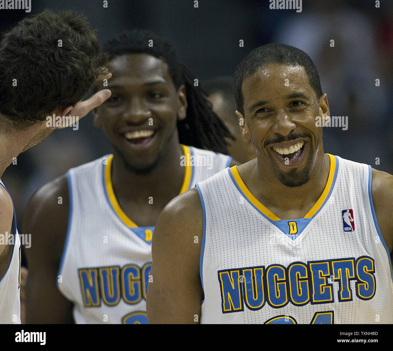Denver Nuggets guard Andre Miller (R) and forward Kenneth Faried are ...