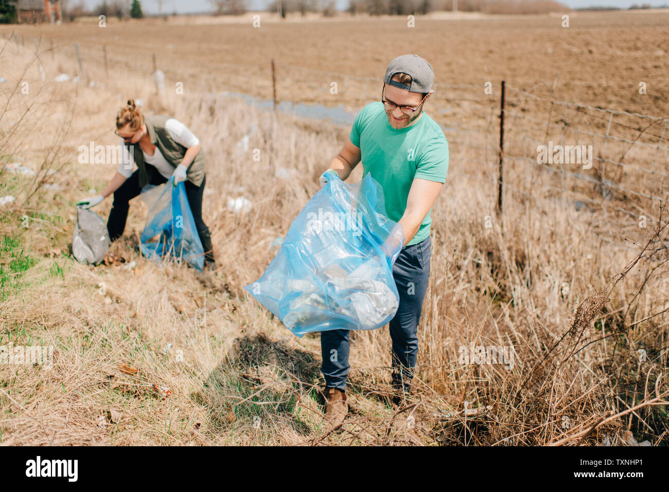 Picking rubbish hi-res stock photography and images - Alamy