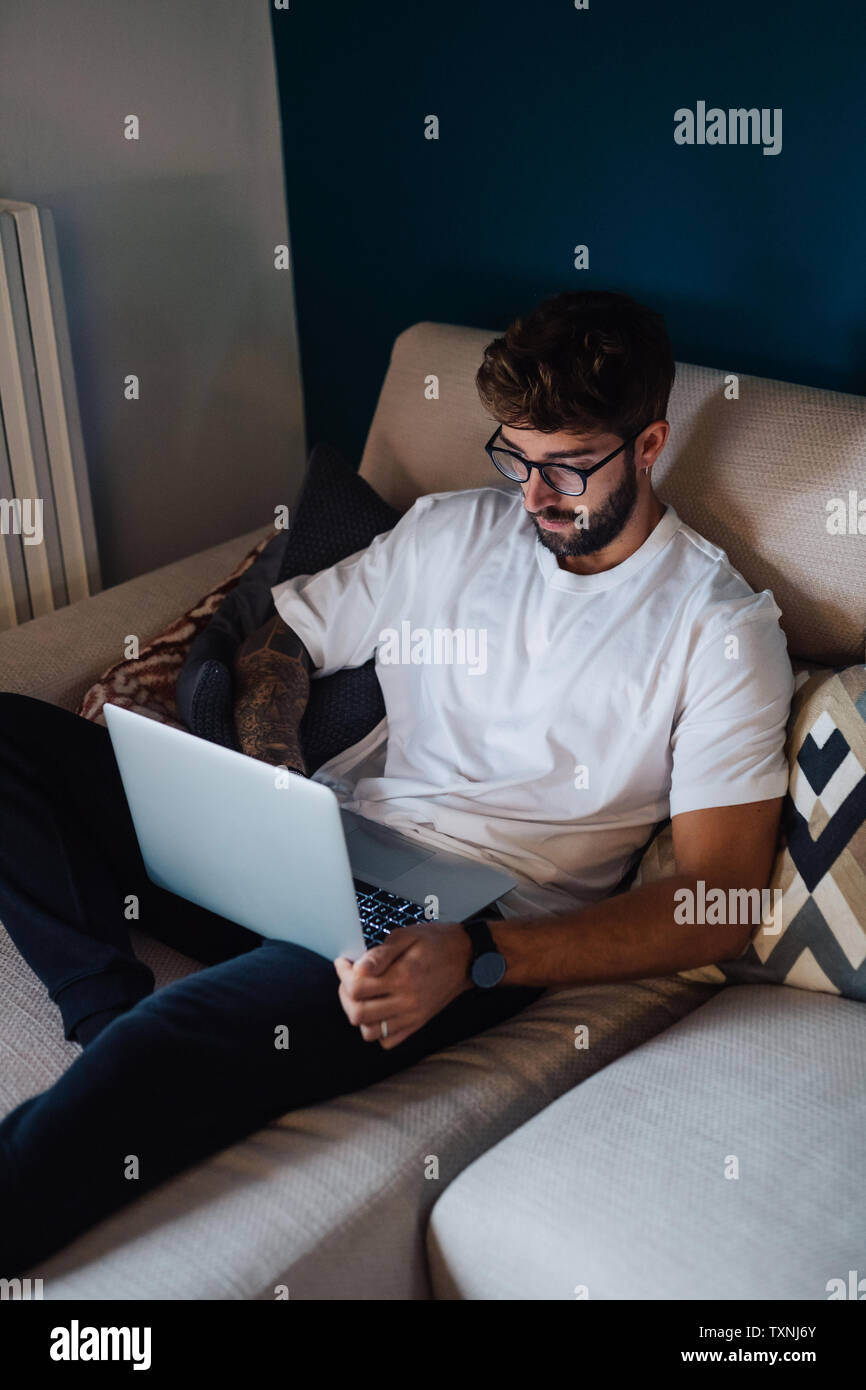 Man reclining hi-res stock photography and images - Alamy