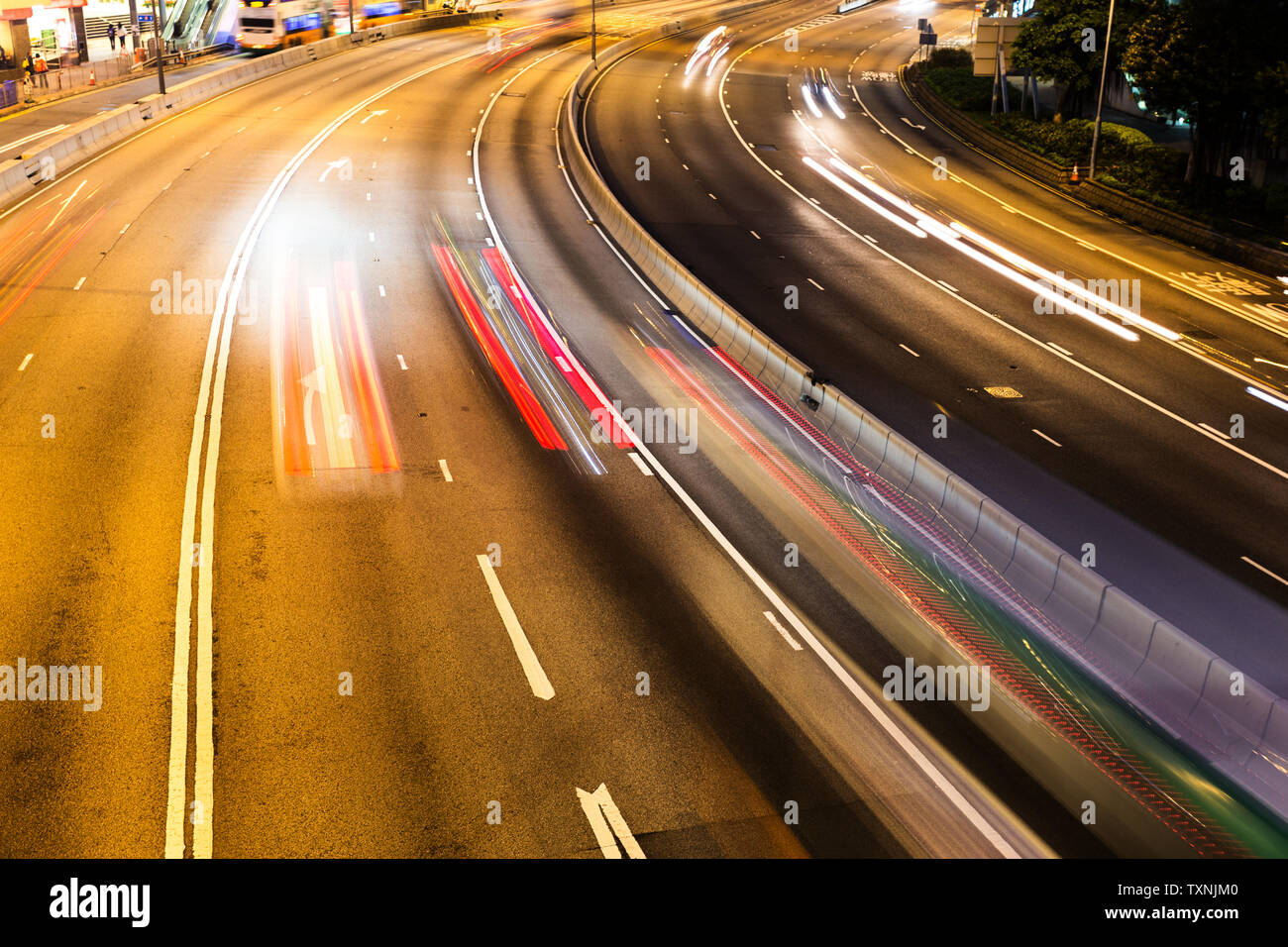 Traffic in city at night Stock Photo - Alamy