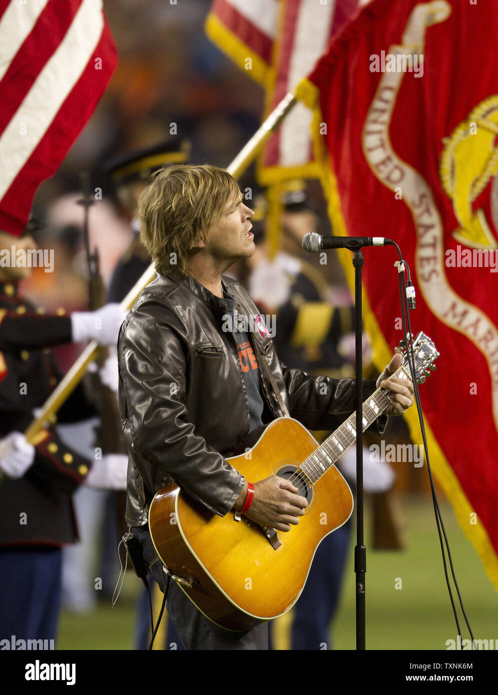 Country music star Jack Ingram sings the national anthem at Sports ...