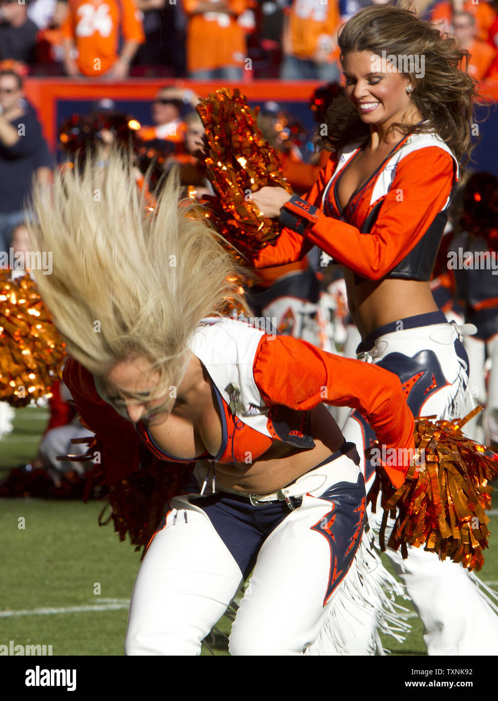 The Denver Broncos Cheerleaders Perform At Sports Authority Field At Mile High On November 18 