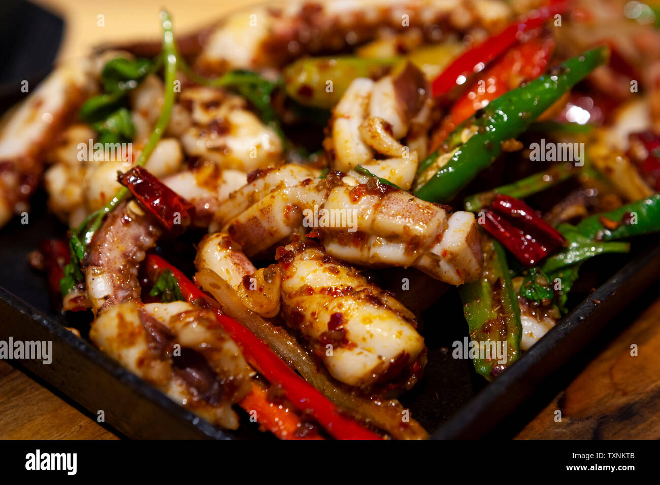 Iron plate squid hi-res stock photography and images - Alamy