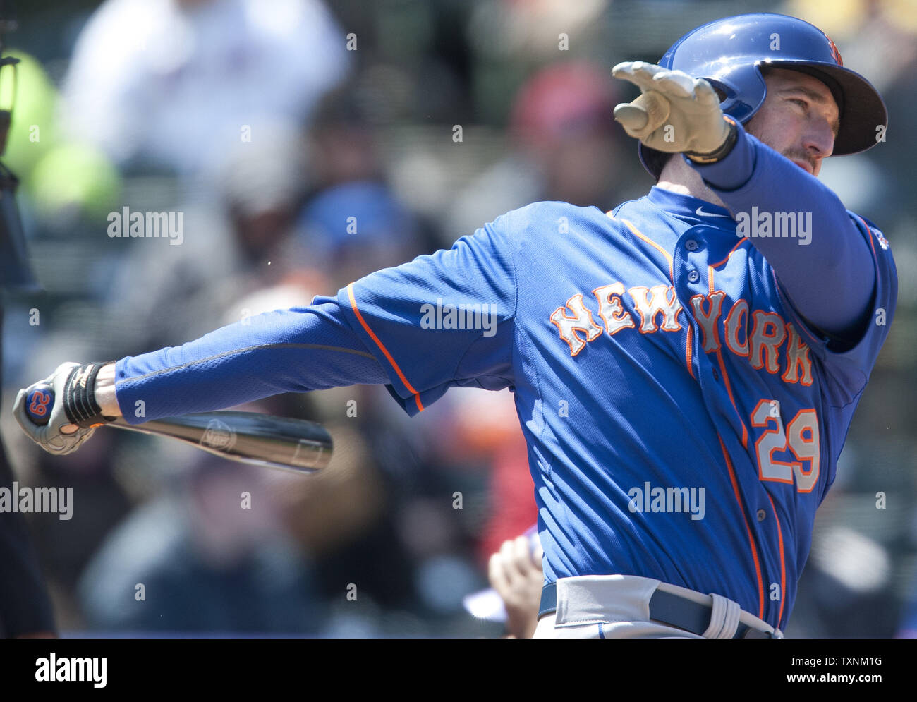 New York Mets first baseman Ike Davis warms up at Coors Field in Denver ...