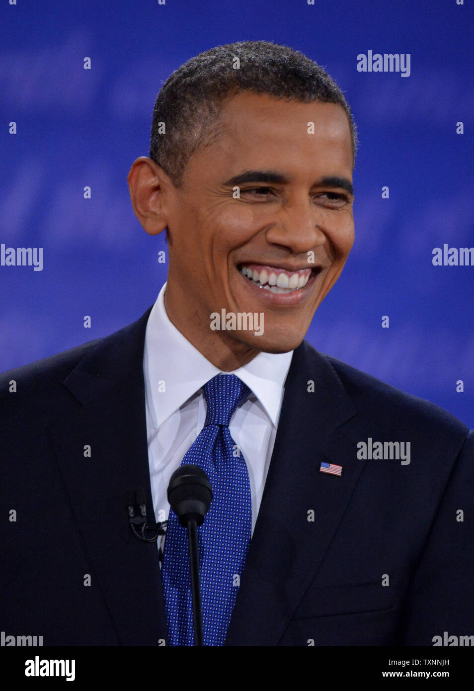 President Barack Obama smiles as he listens to Republican presidential ...