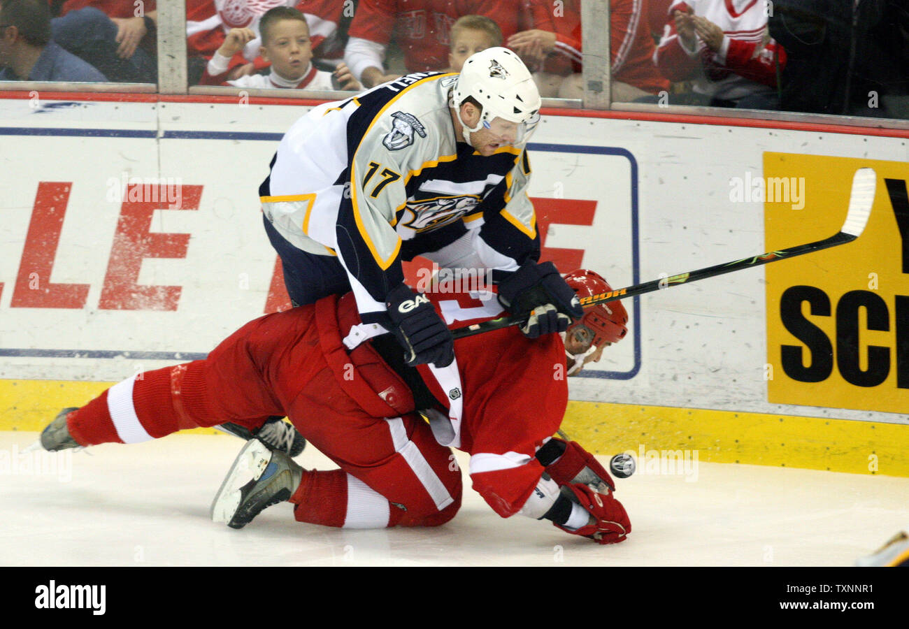 Nashville Predators left winger Scott Hartnell (17) falls over Detroit ...