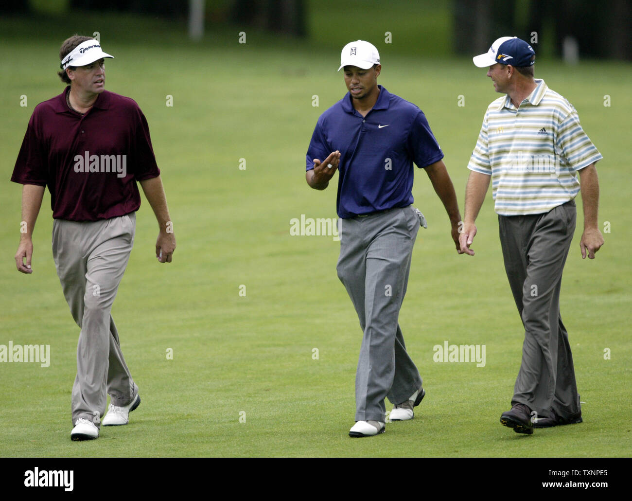 PGA golfers Brent Geiberger, Tiger Woods and Ian Leggatt (L to R) talk ...