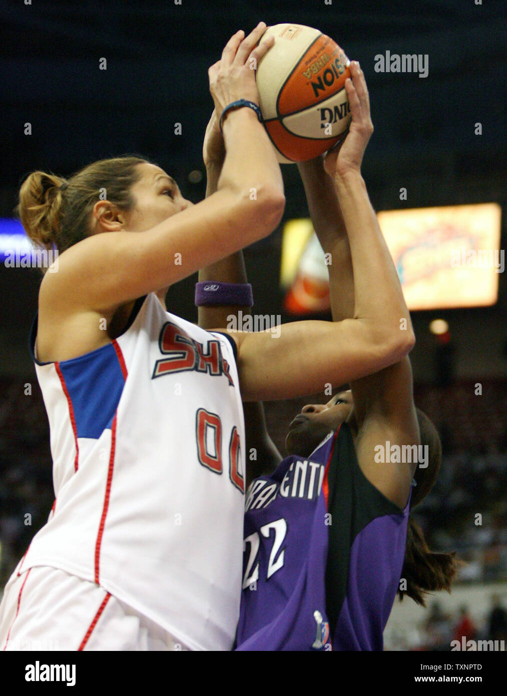 Detroit Shock center Ruth Riley (00) takes a shot as Sacramento ...