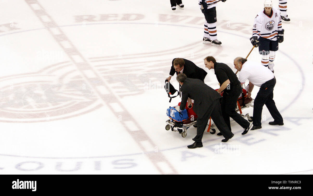 Detroit Red Wings center Jason Williams is rolled off the ice on a ...
