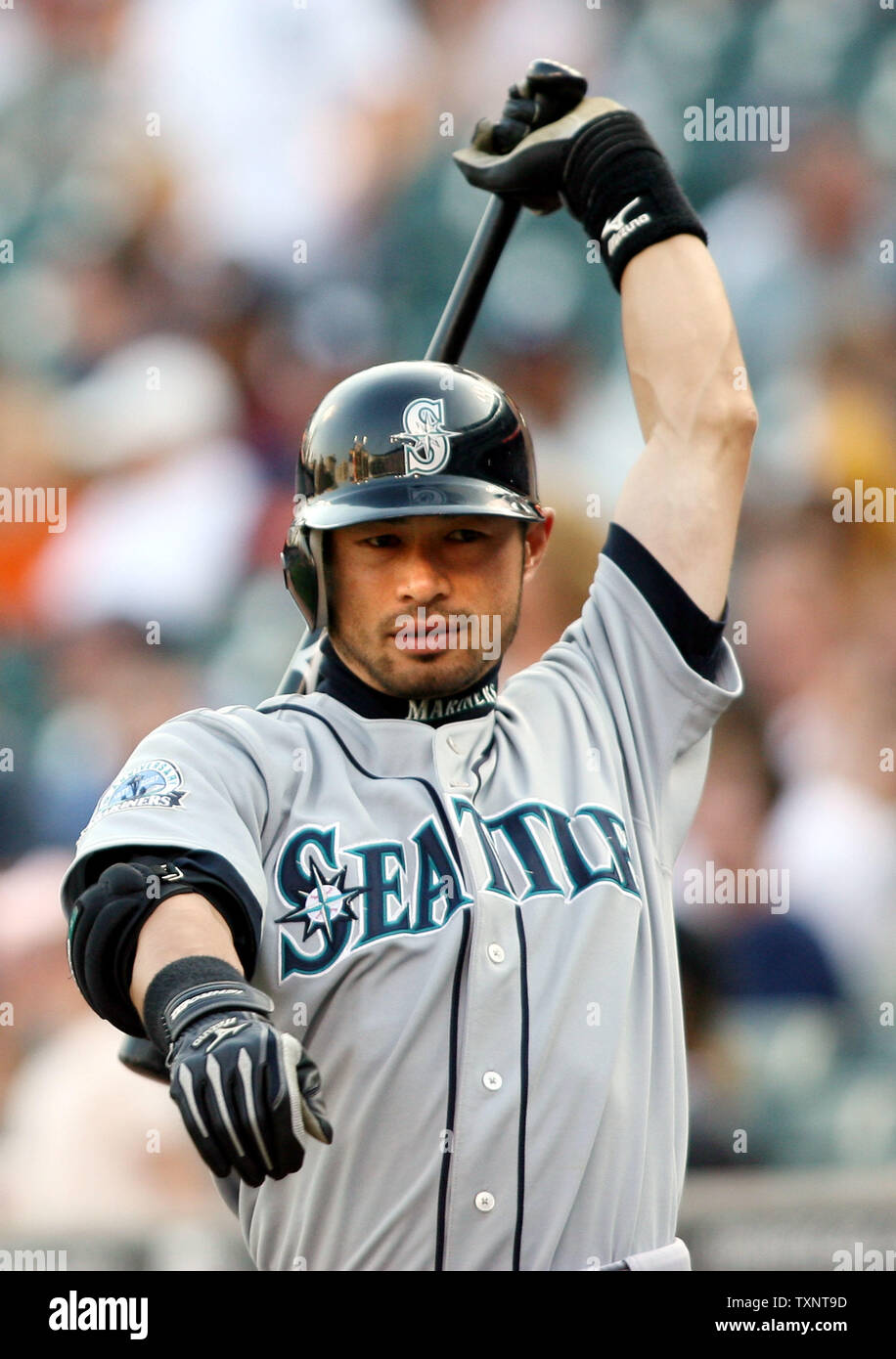 Seattle Mariners Ichiro Suzuki warms up for his first at bat against ...