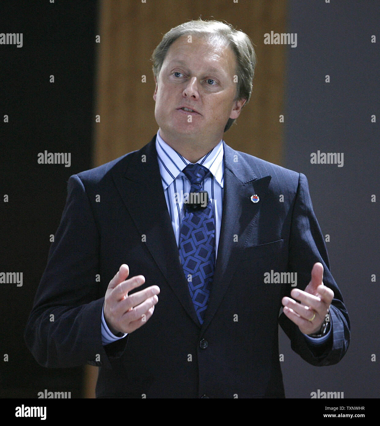 Fisker Automotive CEO Henrik Fisker talks to reporters at the North ...