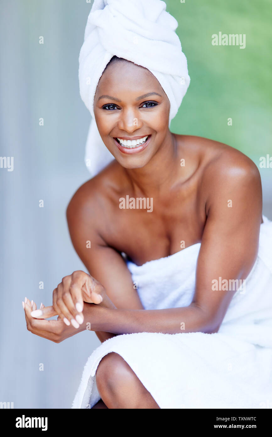 Beautiful ethnic woman wearing towels Stock Photo - Alamy